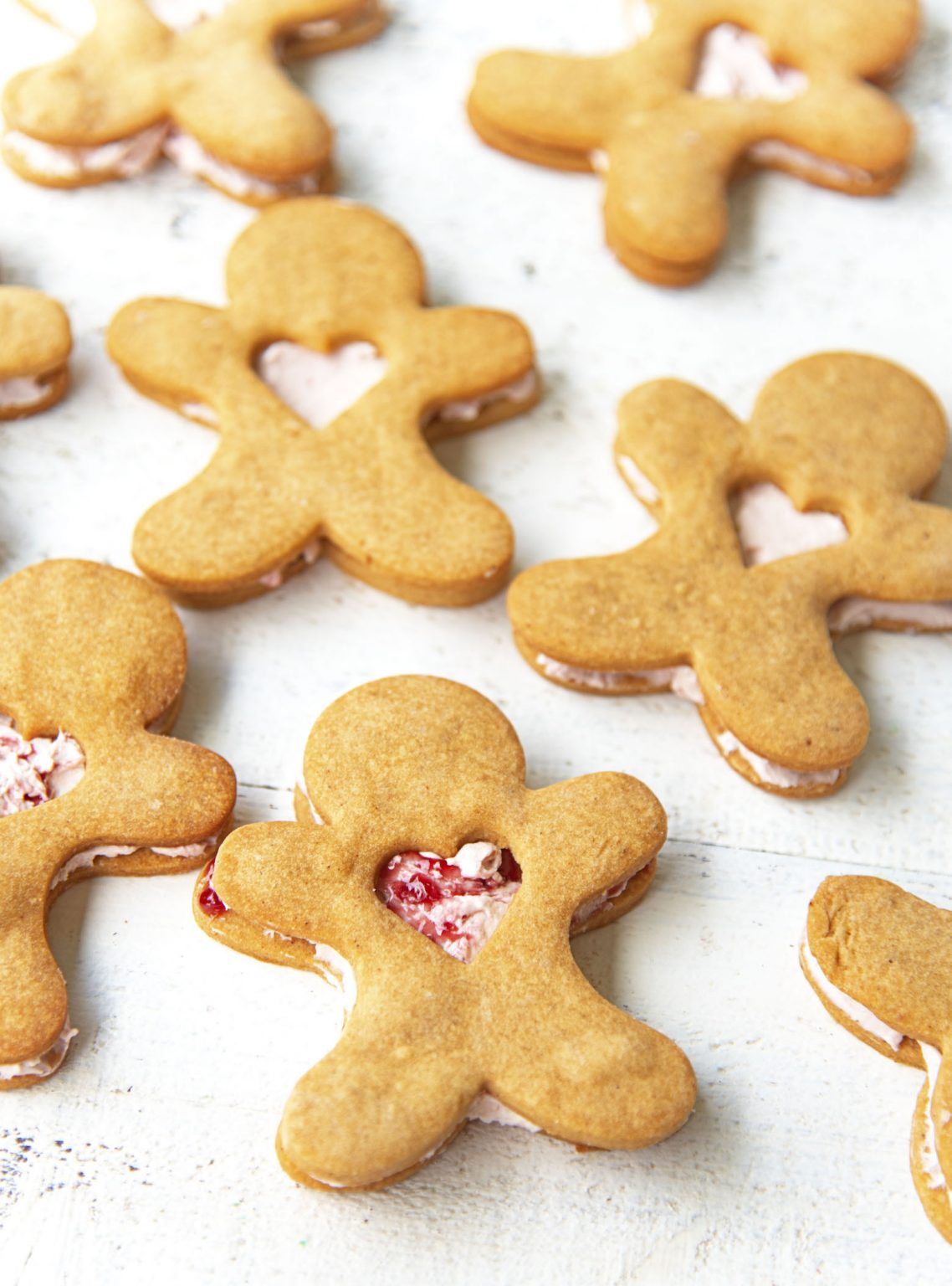 Gingerbread Shortbread Sandwich Cookies with Raspberry Jam Frosting